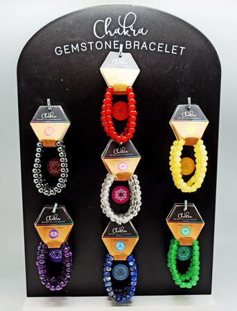 Fantasy Gifts - Set of 35 Gemstone Chakra Bracelets on Display Board ...